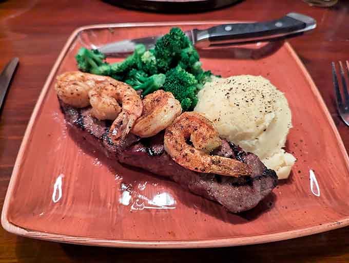 Surf and turf done right, with perfectly grilled shrimp crowning a juicy steak that knows how to make an entrance.