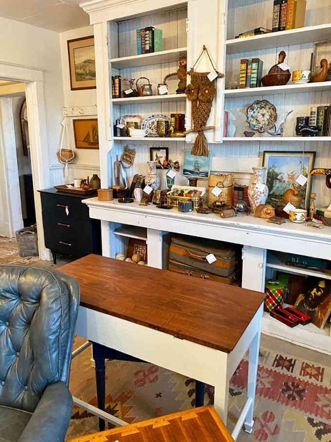 Built-in shelving displaying treasures that make you wonder why anyone ever invented particle board furniture.