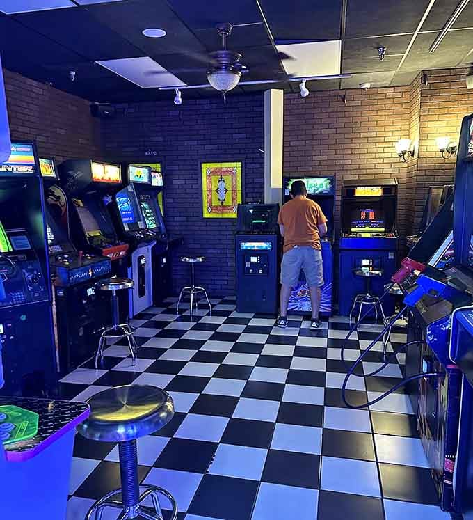 Classic arcade cabinets line the walls like old friends waiting to remind you of simpler, quarter-fed times.