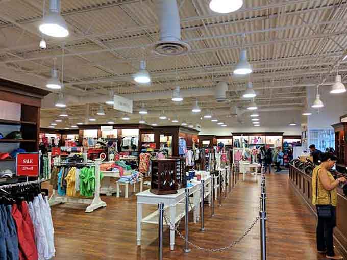 Bright clothing displays organized by size and color, making shopping for the kids almost enjoyable, almost.