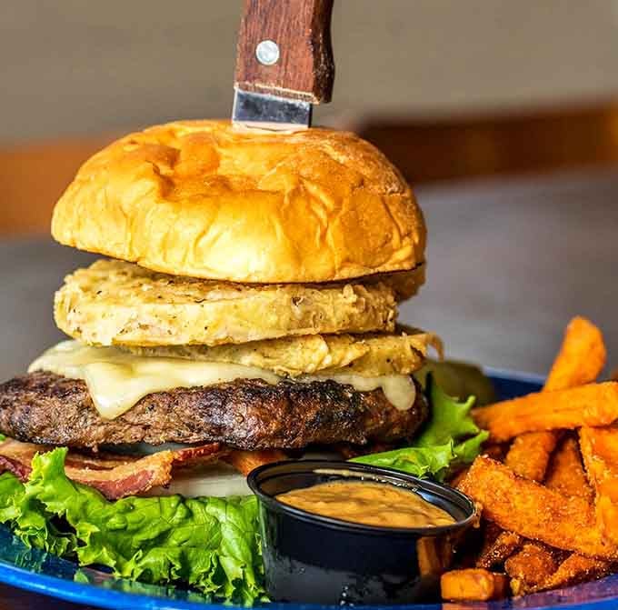 This towering burger topped with fried green tomatoes proves that some movie-inspired ideas are absolutely genius.
