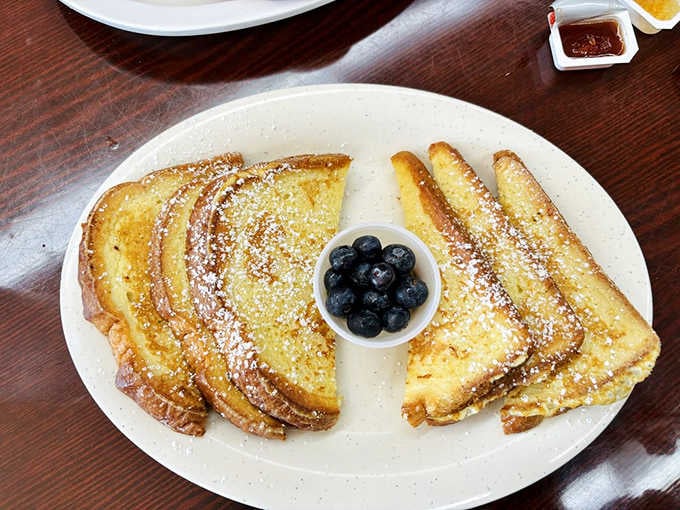 French toast dusted with powdered sugar and served with fresh blueberries is how mornings are supposed to start, period.