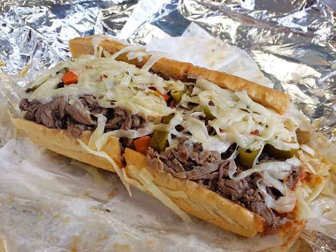 Beef and sausage together on bread, proving that some combinations are simply meant to be, diet be damned.