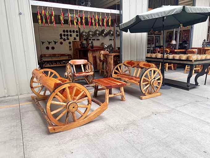 Rustic wooden furniture with wagon wheel charm that'll make your patio look like a Western movie set.