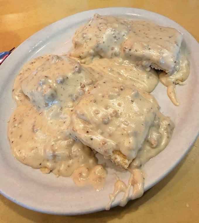 Biscuits drowning in country gravy represent everything right about American comfort food in one glorious, hearty dish.