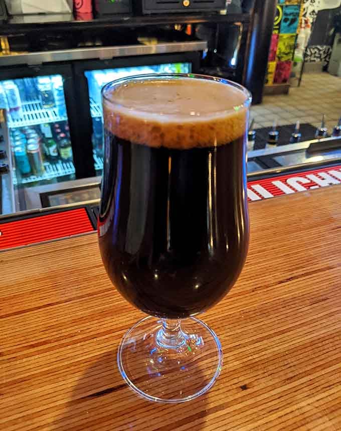 That dark stout sits there looking mysterious and delicious, like the coffee-flavored adult beverage your teenage self always dreamed about.