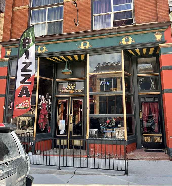Dirty Sally's Pizzeria occupies a storefront where the vintage signage alone is worth the mountain drive and altitude adjustment.