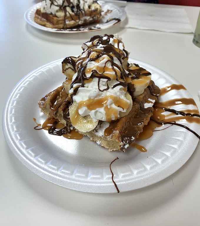 That mountain of whipped cream and caramel isn't just breakfast, it's a delicious dare you'll gladly accept.