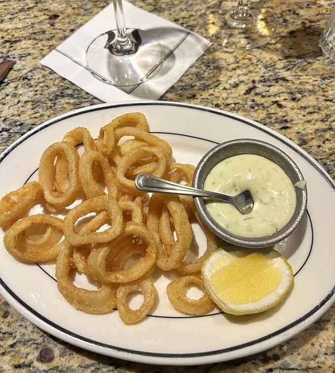 Golden calamari rings with a side of aioli, because sometimes the appetizer deserves its own standing ovation.