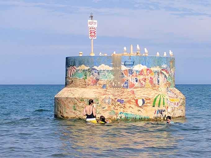 The colorful crib structure offshore adds whimsy to the horizon, like Lake Michigan's own art installation.