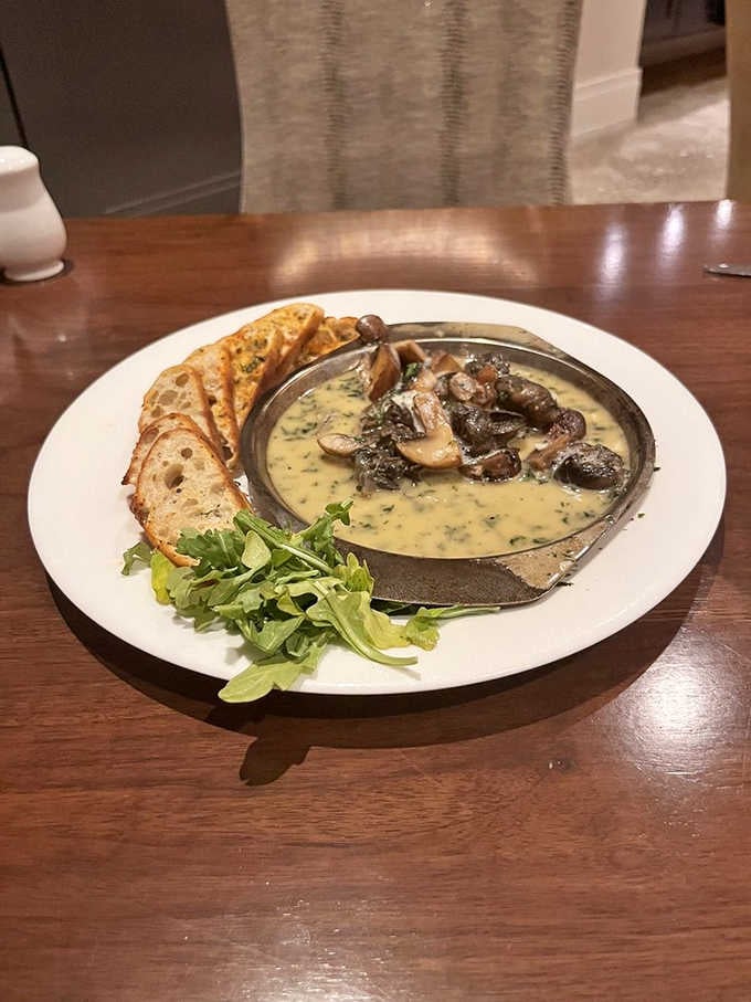 Escargot in garlic butter with toasted bread makes you wonder why more people don't order this classic.