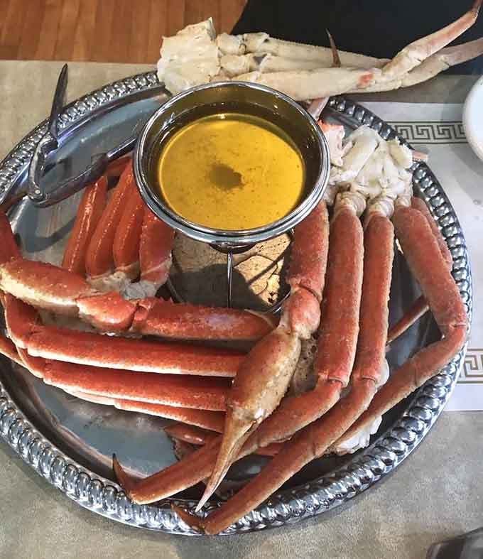 Snow crab legs with melted butter represent the kind of indulgence that makes you forget about calories and remember about happiness.