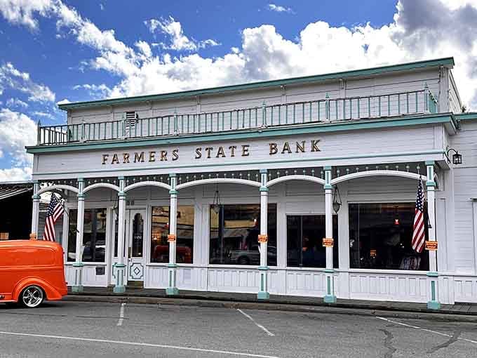 That classic hot rod parked outside the Farmers State Bank is pure Americana, like a Norman Rockwell painting with horsepower.