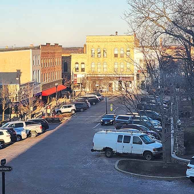 Sunset hits these historic buildings just right, turning an ordinary street into something worth photographing for once.