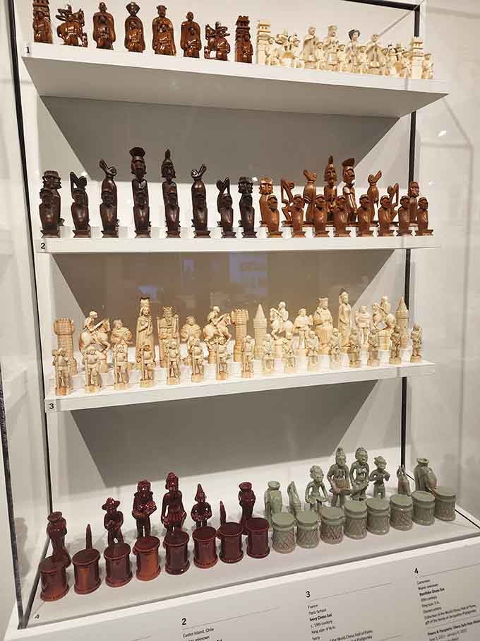 Shelves showcase chess sets ranging from whimsical to traditional, each telling its own cultural story beautifully.