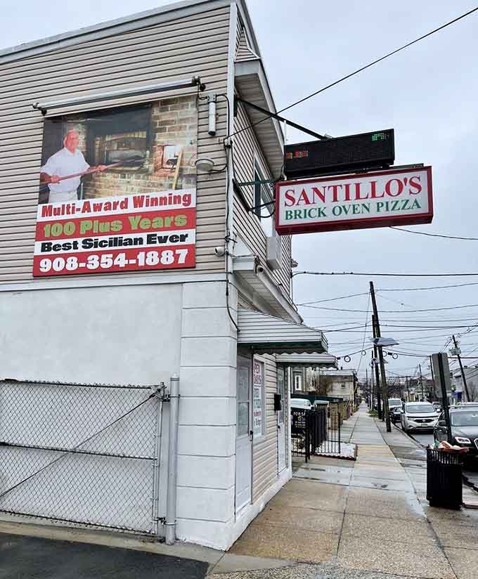 Over a century of pizza-making wisdom advertised right on the building—Santillo's wears its history like a badge of honor.