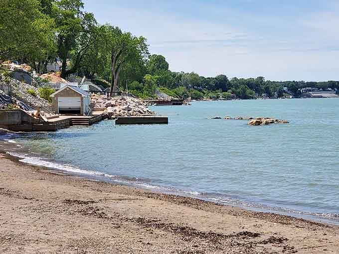 Lake Erie's gentle waves lap against rocky shores where locals have gathered for summer fun since their grandparents' days.