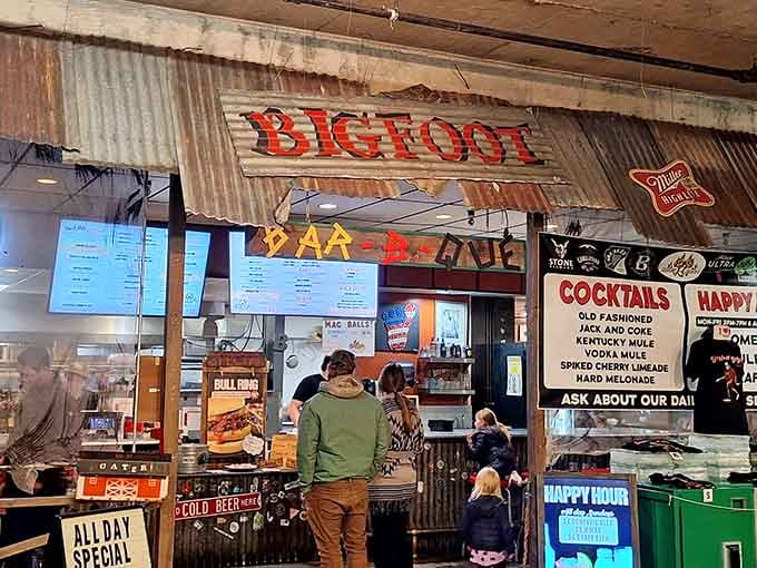Corrugated metal and rustic signs create an industrial-chic vibe that perfectly matches the smoky barbecue inside.
