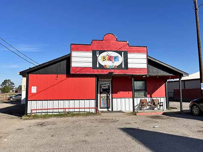 Bold red and white stripes make this diner pop like a cheerful present waiting to be unwrapped.