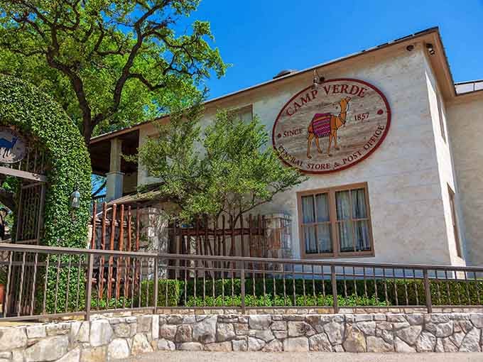 Stone foundation meets Hill Country charm where that camel logo promises adventures in dining and old-fashioned general store browsing.