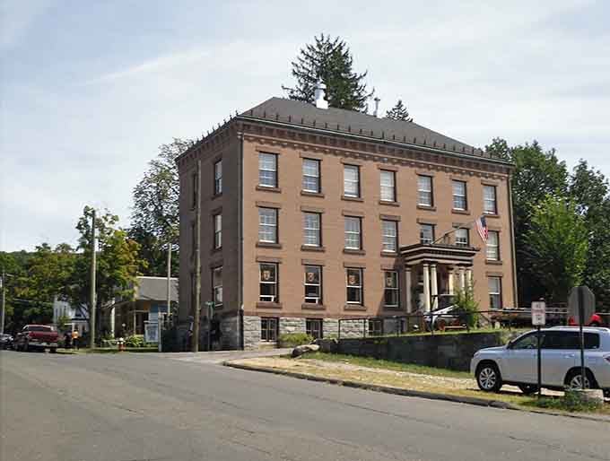 This sturdy brownstone has weathered generations, and the restaurants inside have perfected their craft through decades.