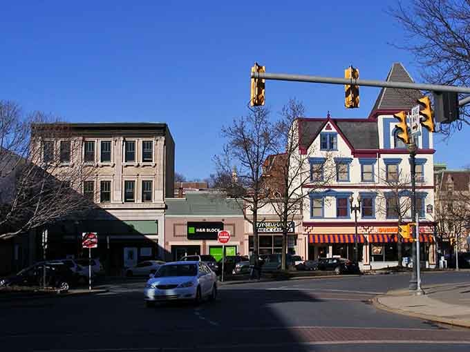 Easton's intersection blends Victorian elegance with small-town practicality, where traffic lights dance with turrets and gabled roofs.