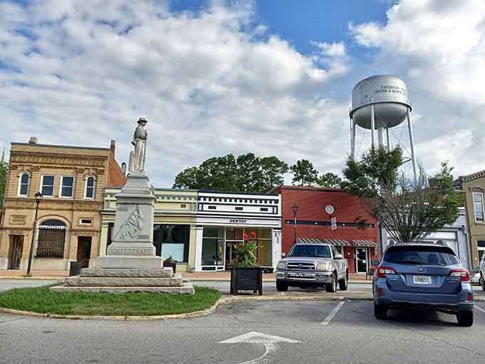 That Confederate monument and classic storefronts frame a downtown frozen in time, history visible on every corner here.