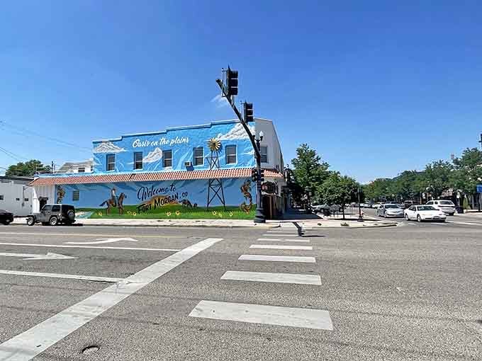 That cheerful blue mural celebrates the agricultural heritage that built these plains towns and still sustains them through changing times.
