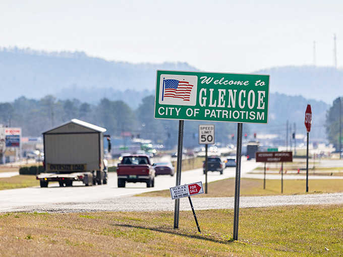 That "City of Patriotism" sign greets visitors with pride, flags flying higher than your retirement dreams.