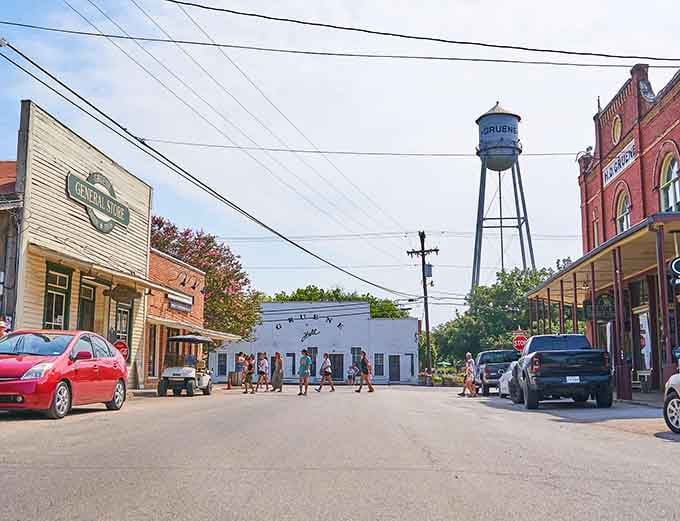 The old water tower watches over this charming street like a friendly giant keeping an eye on the neighborhood.