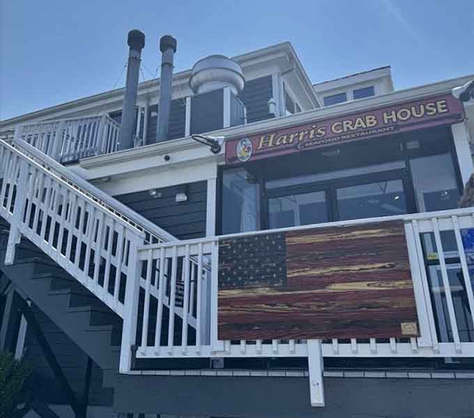 White staircases climb toward waterfront dining where the views rival the crabs for your attention and admiration.