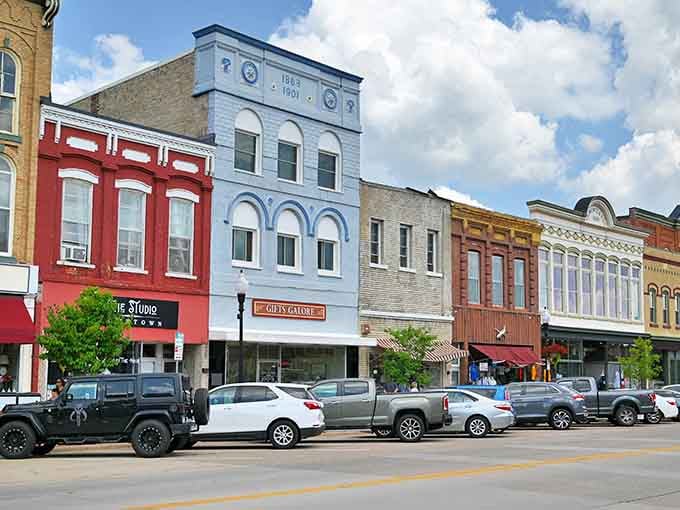 A rainbow of facades lines up like a box of crayons, each building adding its own colorful chapter to downtown.