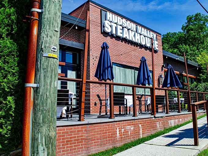 That modern brick facade with the bold signage tells you this place takes its steaks as seriously as Sunday football.