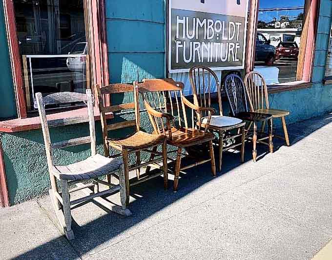 Vintage chairs lined up outside like they're auditioning for your dining room &ndash; how can you resist?