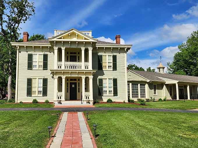 This elegant home's symmetrical facade and manicured lawn whisper tales of gracious Southern hospitality and sweet tea.
