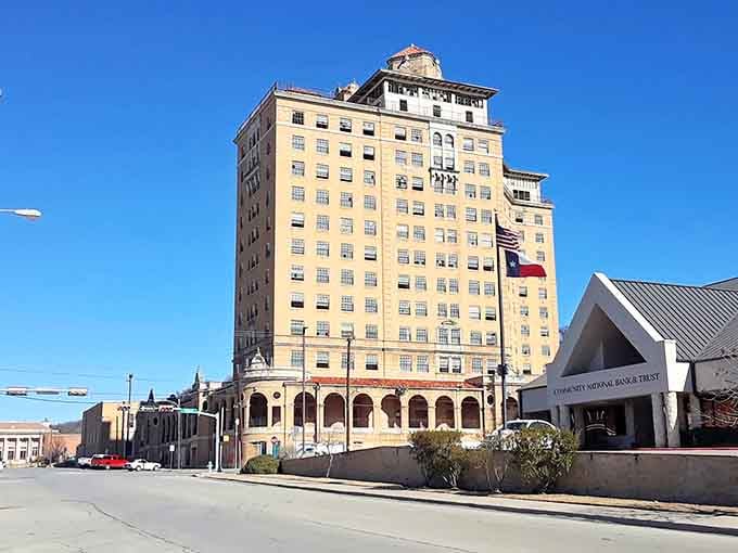 This towering beauty has watched over downtown for generations, standing proud like a lighthouse guiding ships through time itself.