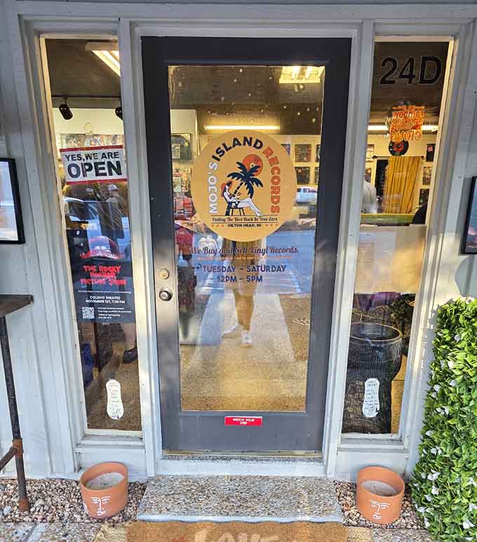 Island vibes meet vinyl paradise at this charming entrance where beach life and music culture blend perfectly together.