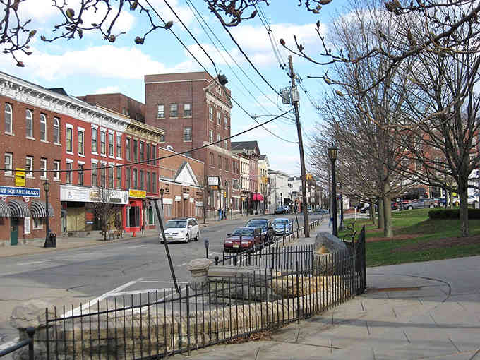 Downtown streets lined with historic buildings where every restaurant competes to become your new favorite neighborhood spot forever.