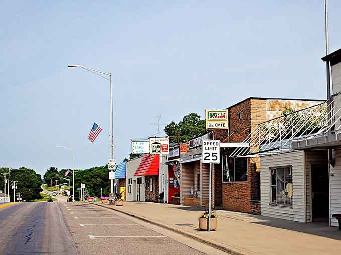 That American flag waving over quiet streets and local shops represents everything good about small-town America that still exists today.