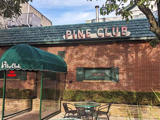 The green awning and classic brick facade stand as timeless proof that legends never go out of style.