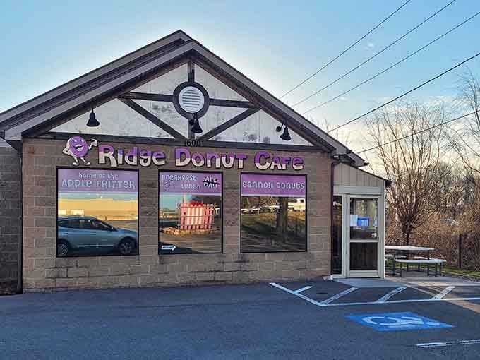 Purple accents and window posters advertising apple fritters make this cafe impossible to miss or resist.