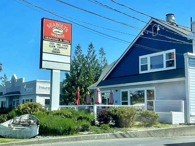 That classic roadside sign promises what every seafood lover craves: honest fish, golden chips, and island hospitality.