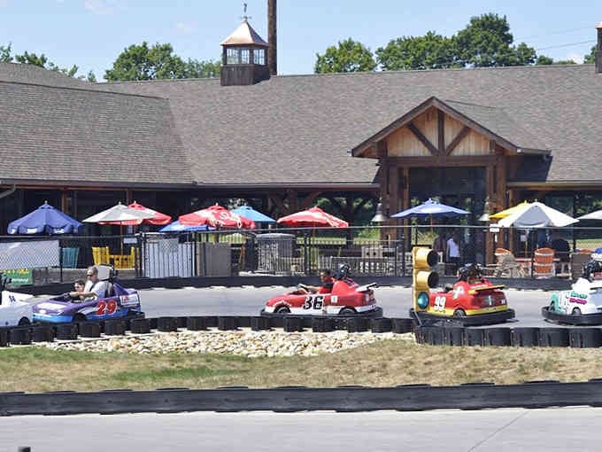 Colorful go-karts line up at the starting line, ready to deliver thrills faster than you can say "gentlemen, start your engines!"