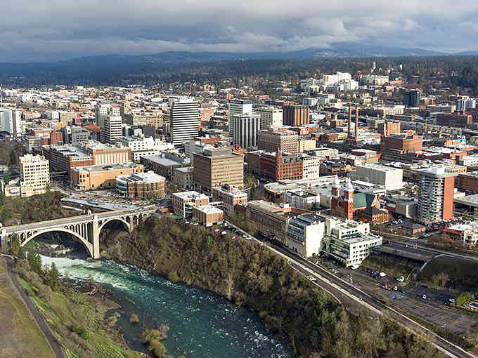 The river cutting through downtown with that iconic bridge &ndash; Spokane's got urban beauty figured out from every angle.
