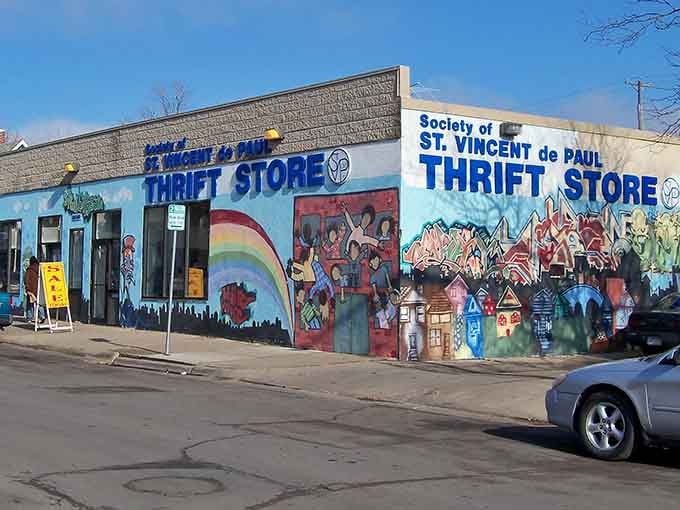 This vibrant mural transforms a simple storefront into a celebration of community, color, and the joy of giving back.