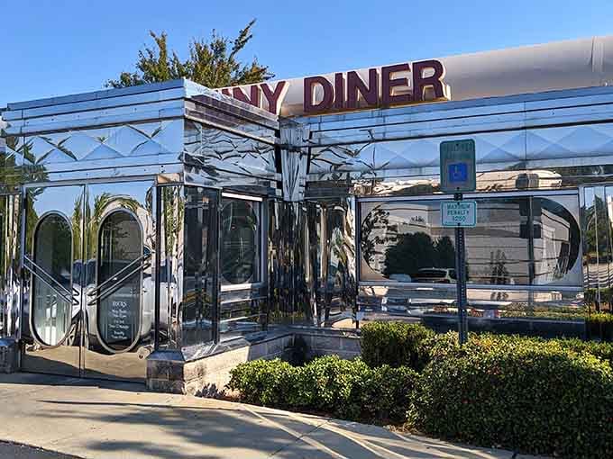 That gleaming chrome exterior catches the light like a beacon, calling hungry travelers to experience true diner magic within.