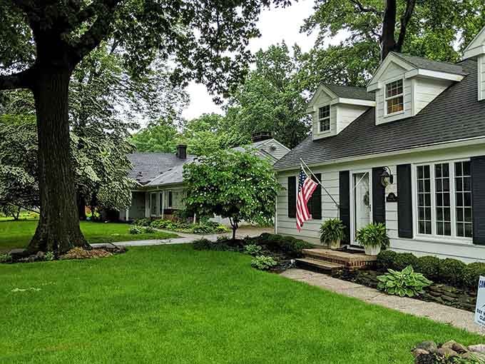 Mature trees shade well-kept homes where American flags wave and neighbors know each other by their first names.