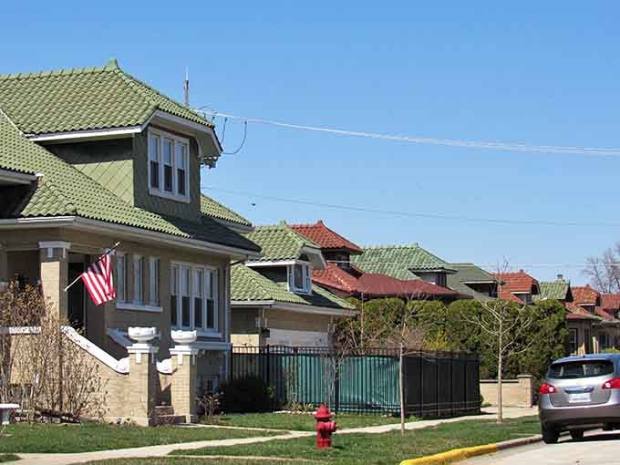 Those distinctive green-tiled roofs add Mediterranean flair to sturdy homes built for families who put down roots.