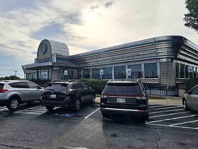 That packed parking lot at dusk tells you everything about how good the food must be.
