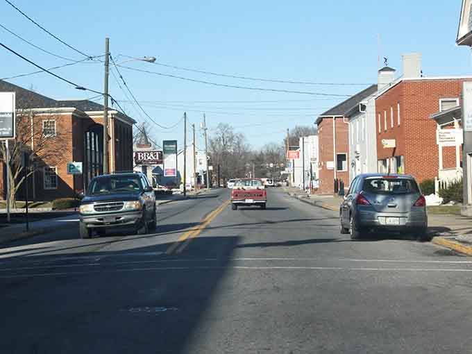 Main Street hums quietly&mdash;brick buildings, passing cars, and a rhythm that feels both local and timeless.
